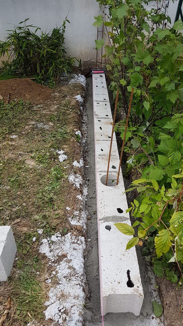 Construction murs mitoyens béton - Aidlib maçonnerie paysagère